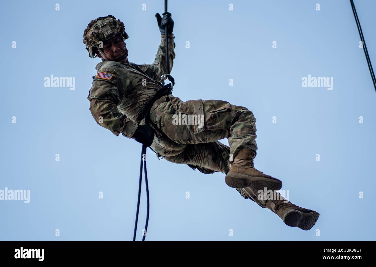 A 101st Airborne Division (Air Assault) Soldier rappels from the Air ...