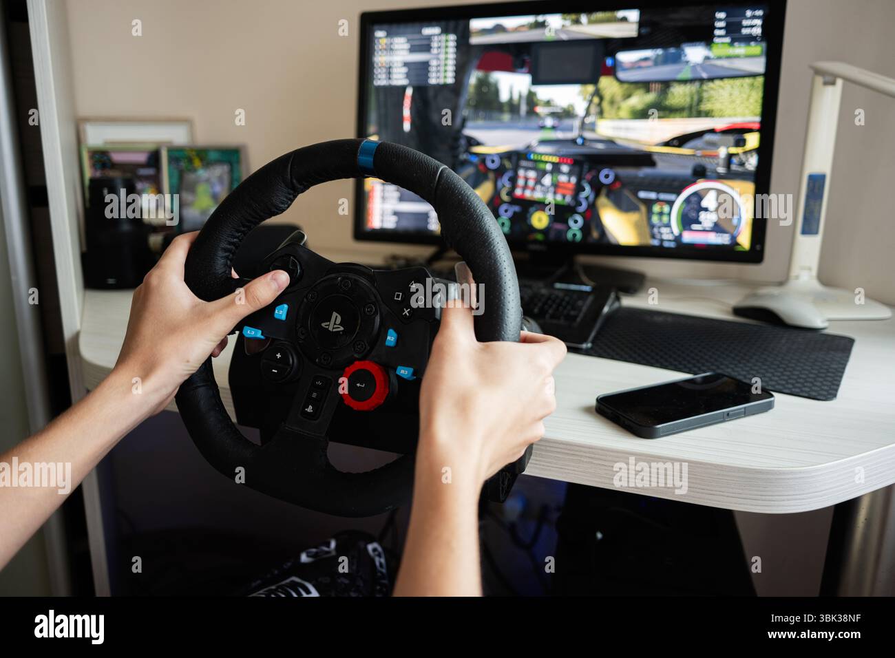 Kyiv, Ukraine - June 17, 2025: Active gaming setup with steering wheel ...