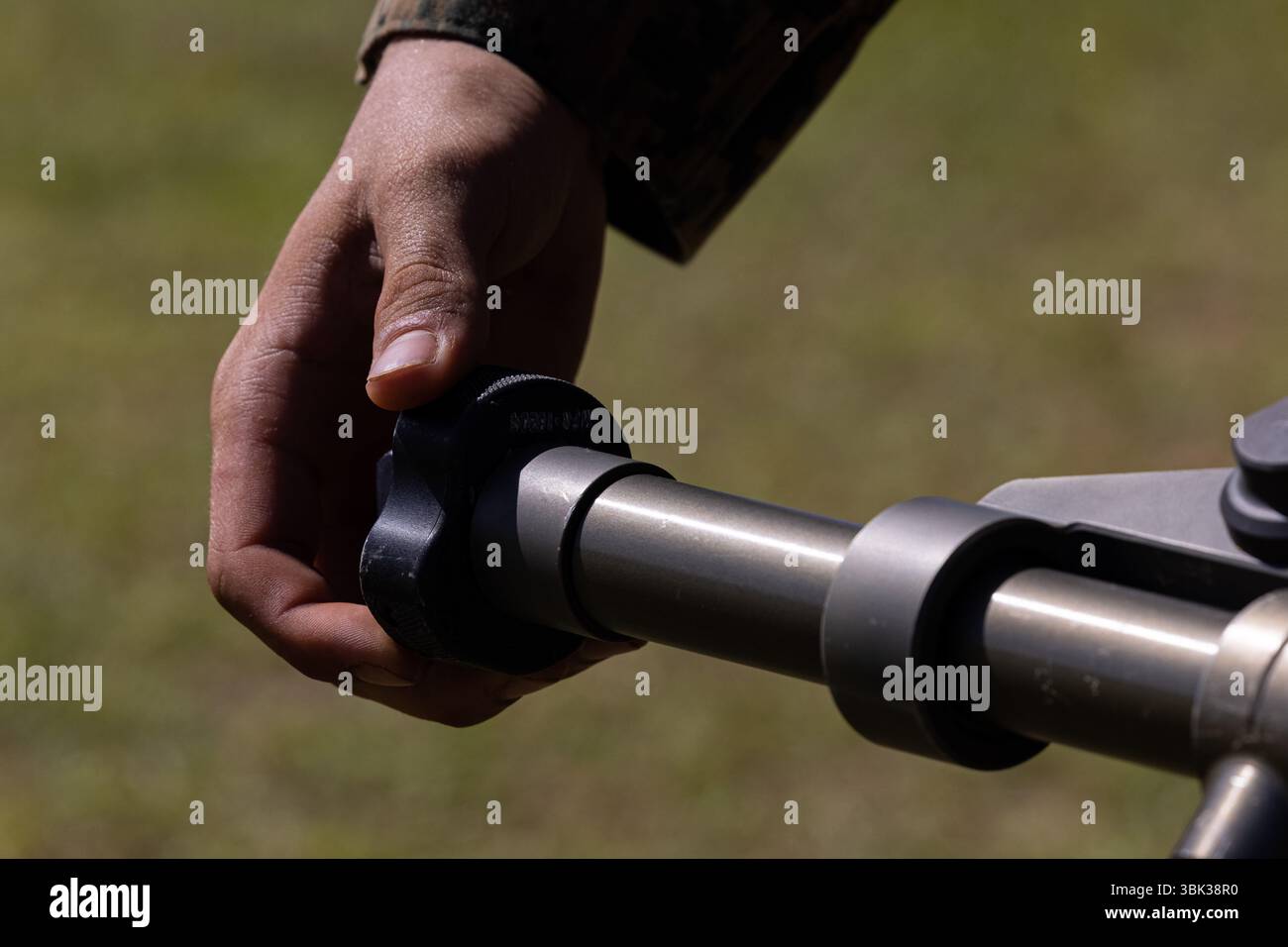 U.S. Marine Corps Pfc. Mason Catli adjusts an M224 60mm mortar before a ...
