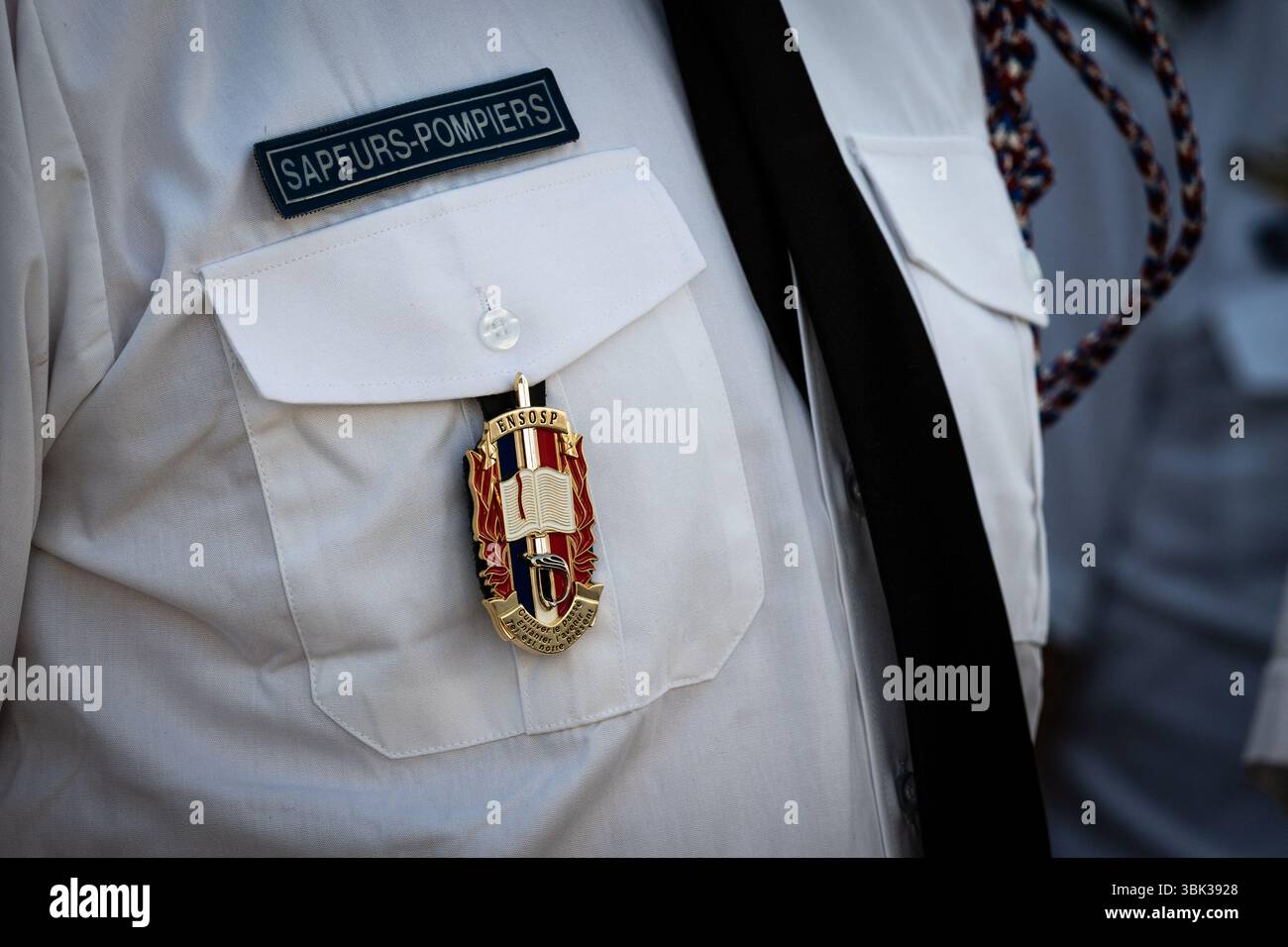The logo and crest of the Ecole Nationale Superieure des Officiers Sapeurs-pompiers (ENSOSP) in ...