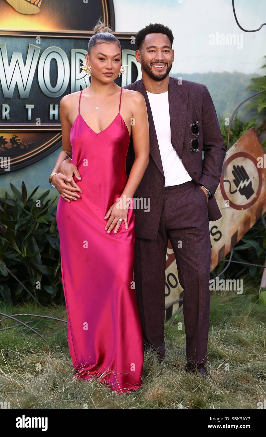 London, UK. 17th June, 2025. Josh Denzel (R) and Ruby Wong attend the Jurassic World Rebirth ...
