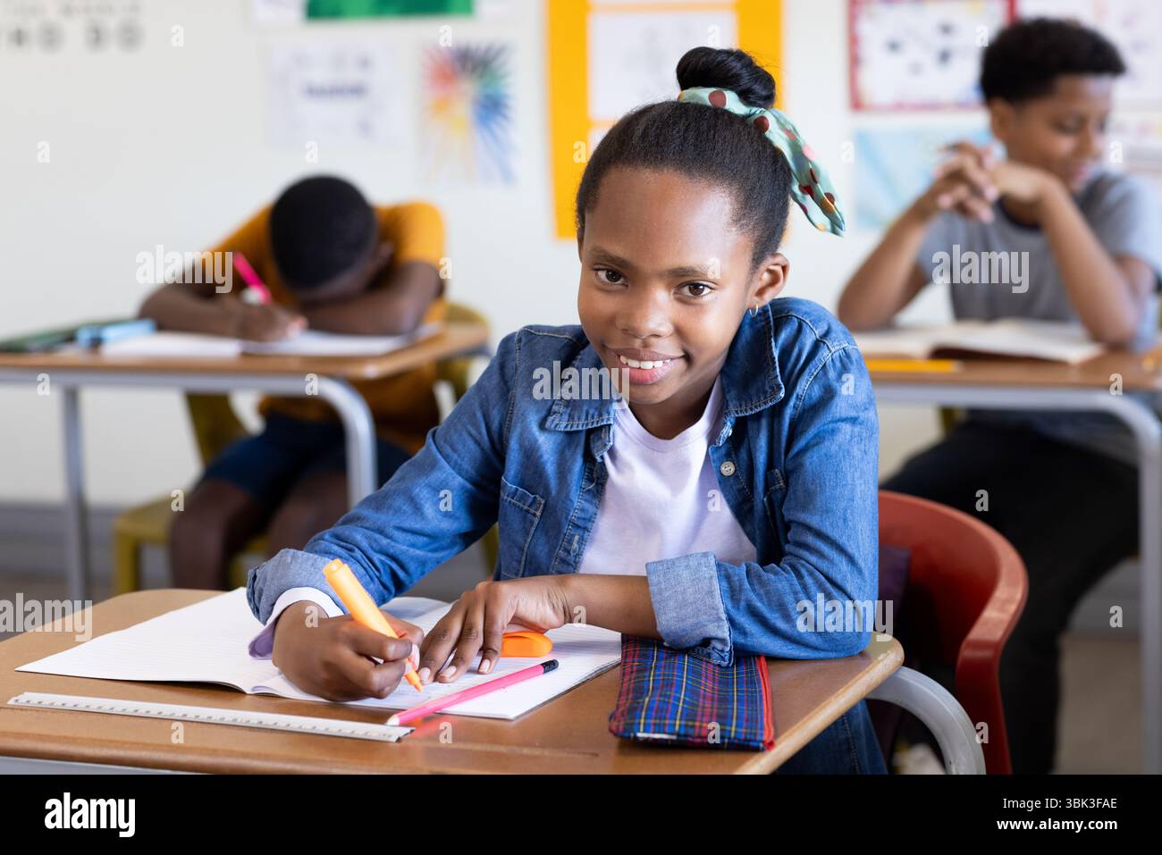 Asian hispanic girl writing hi-res stock photography and images - Alamy
