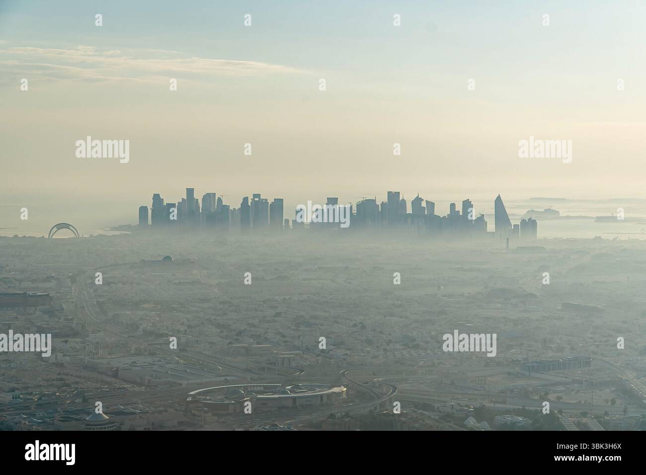 Doha, Qatar - June 10, 2025: humid and dusty Doha skyline view in ...