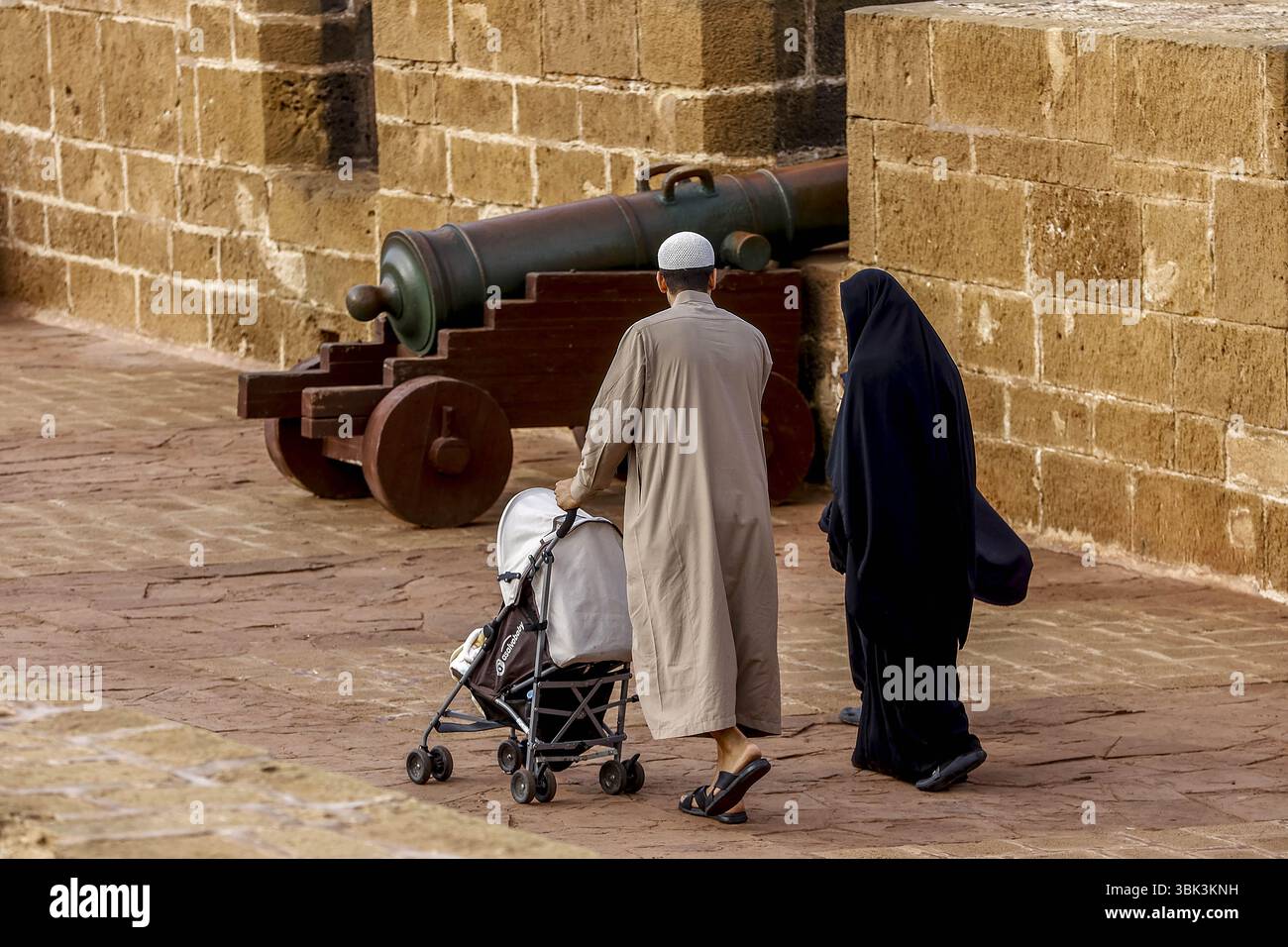 Muslim family visiting the Kasbah sqala, also called medina sqala, Essaouira, Morocco Stock ...