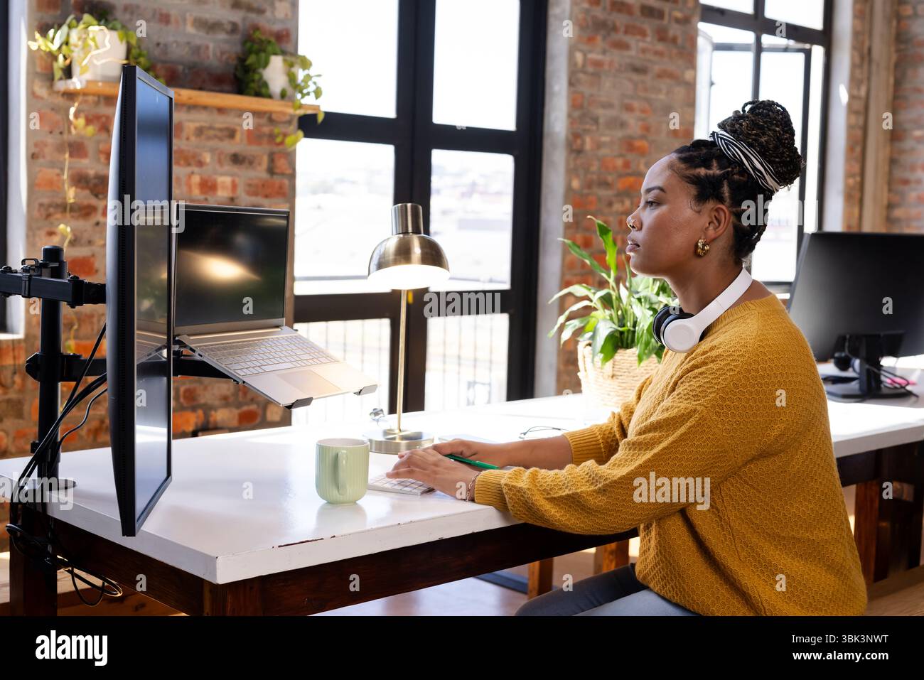 Tech savvy woman coding hi-res stock photography and images - Alamy