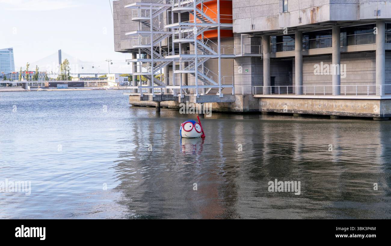 Lisbon, Portugal - 18 May 2025: Smiling cartoon mascot of the Oceanario ...