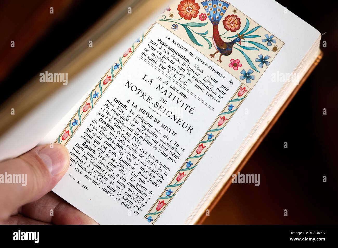 Catholic man reading an illustrated missal. Nativity of Jesus or birth ...