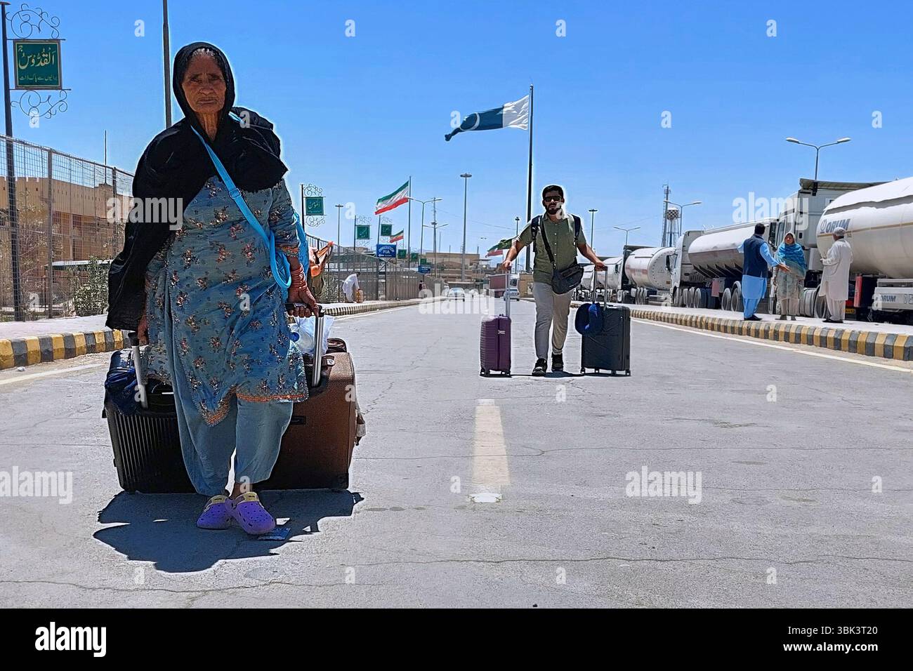 Pakistanis, who were stuck in Iran due to Israeli strikes on Iran, walk ...