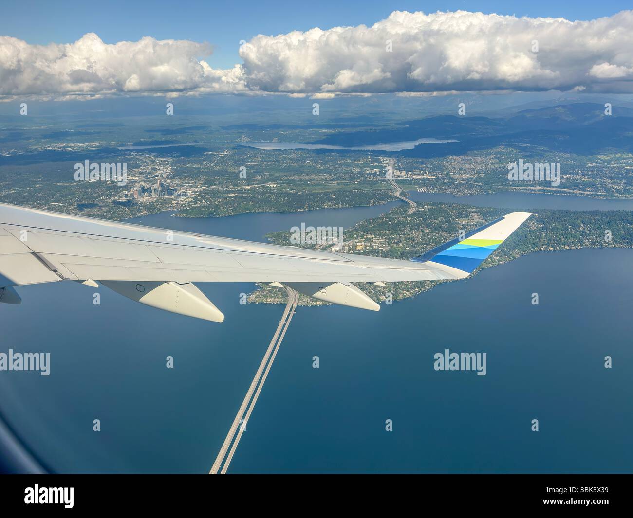 Seattle, USA - 12 MAY 2025 - A Plane taking off over properties and ...