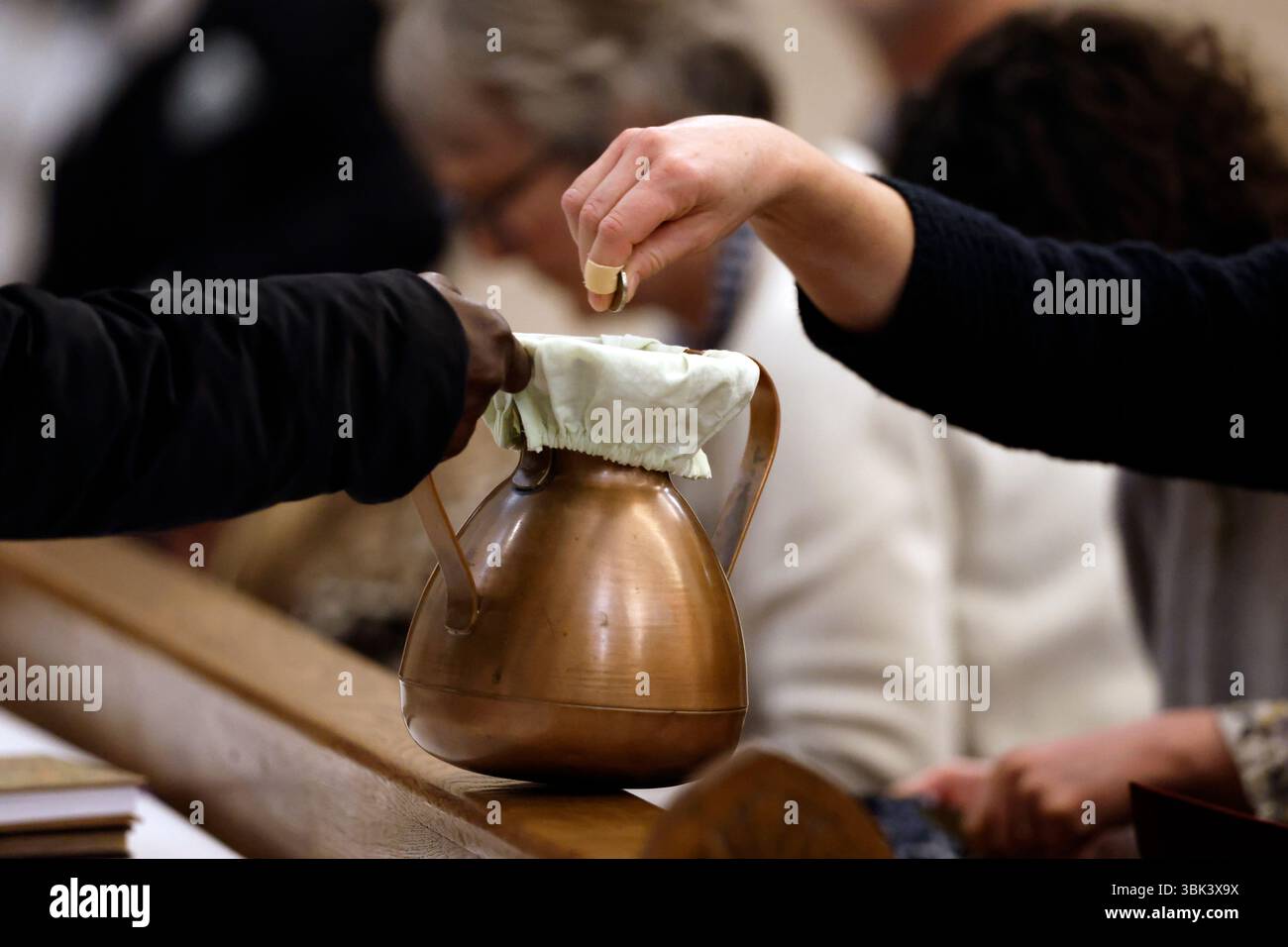 Catholic church. Collection during holy mass. Saint Pierre et Paul ...