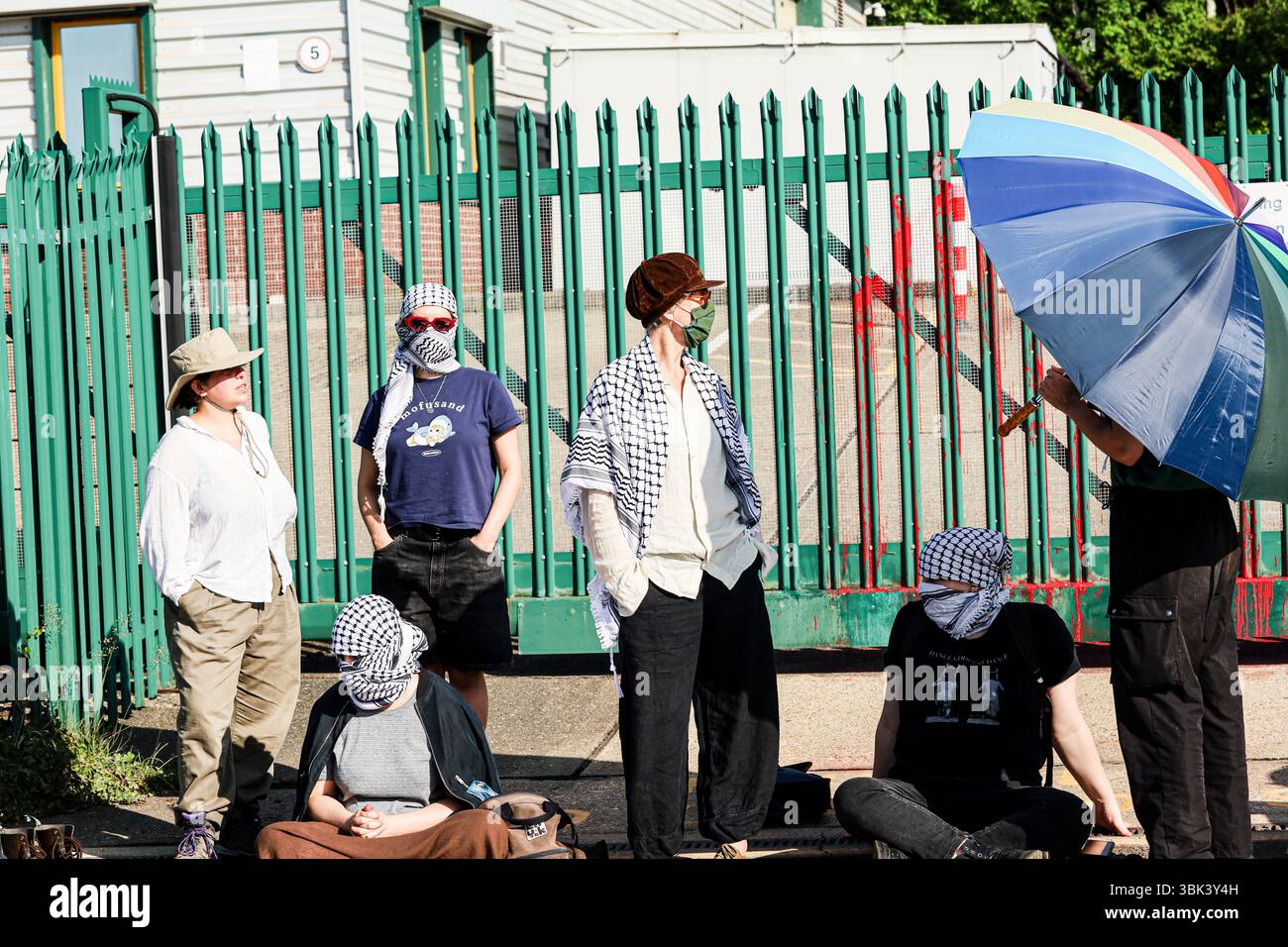 Brighton, UK. 17 June 2025. Activists gather outside the premises of ...