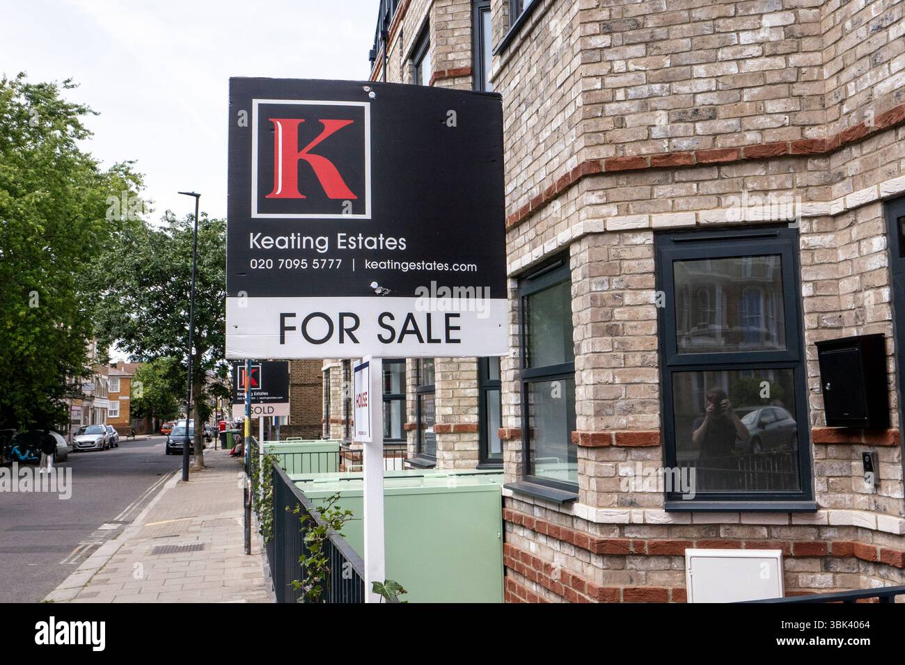Keating Estates For Sale sign along residental street in London ...