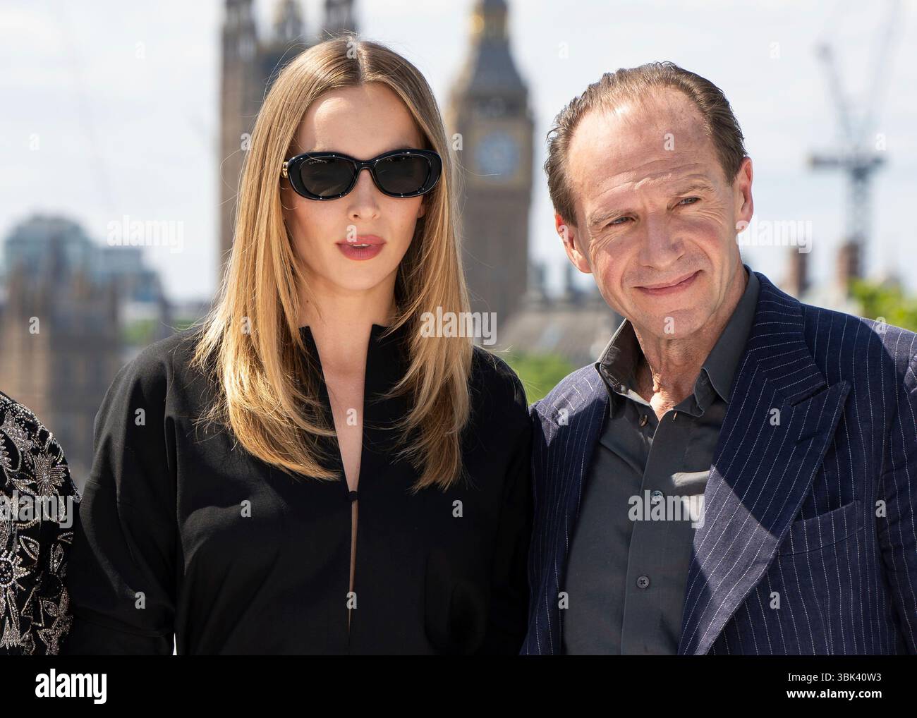 Jodie Comer, left, and Ralph Fiennes poses for photographers upon ...