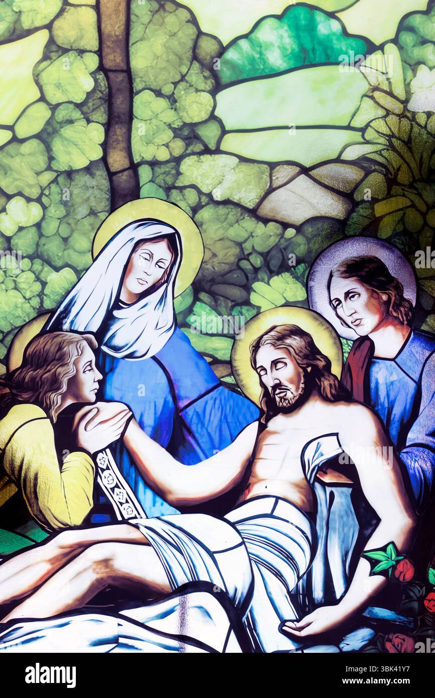 Way of the cross. 13th Station: Jesus is taken down from the Cross ...