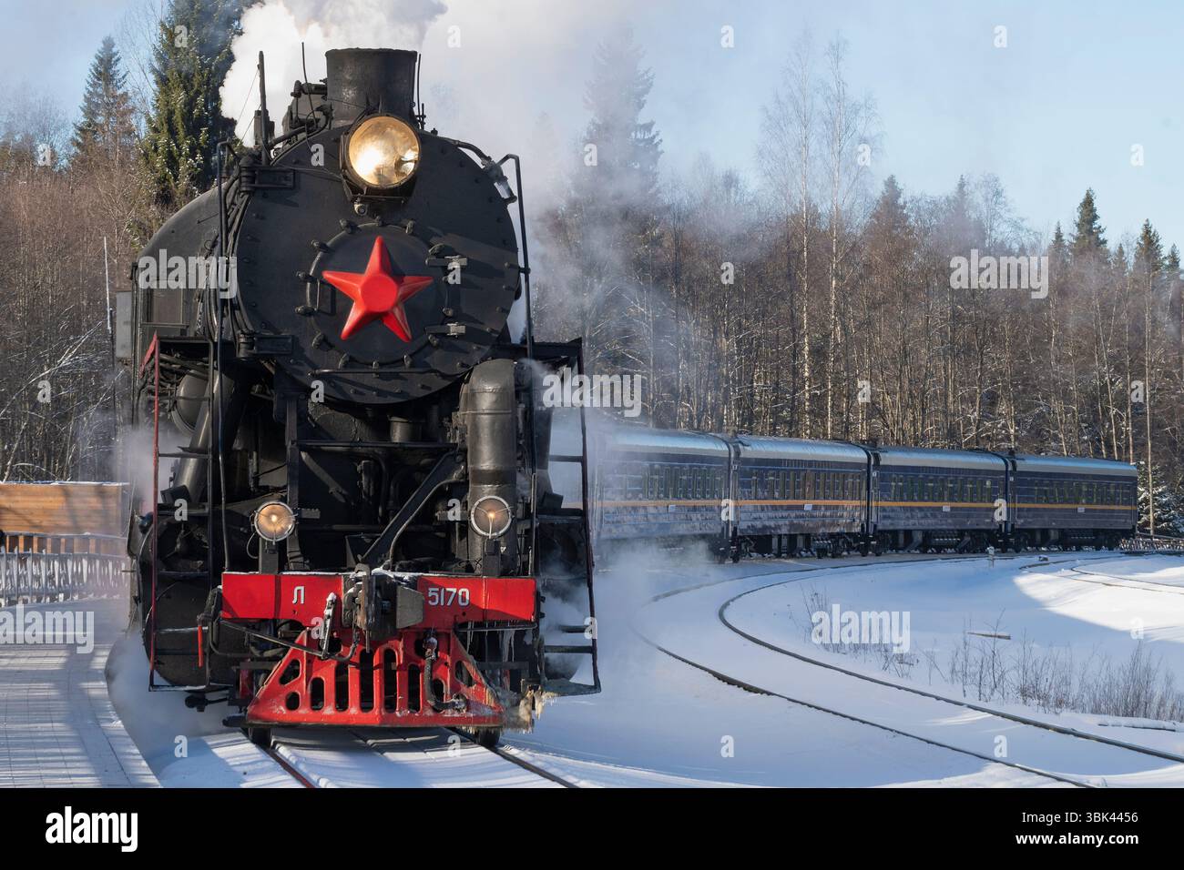 RUSKEALA, RUSSIA - FEBRUARY 20, 2025: Retro train "Ruskeala Express" on ...