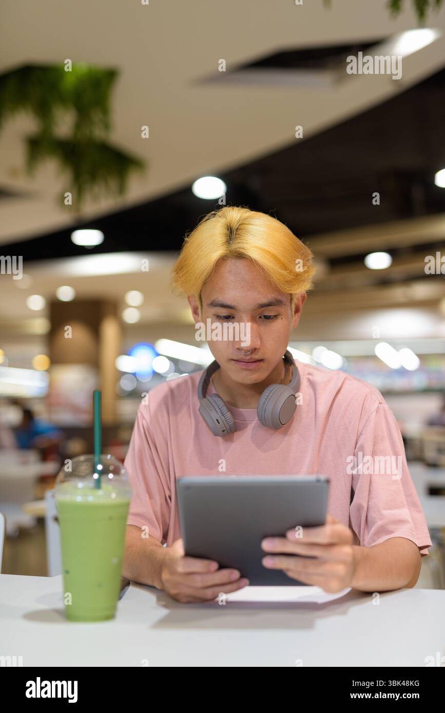 Young blonde gay man hi-res stock photography and images - Alamy