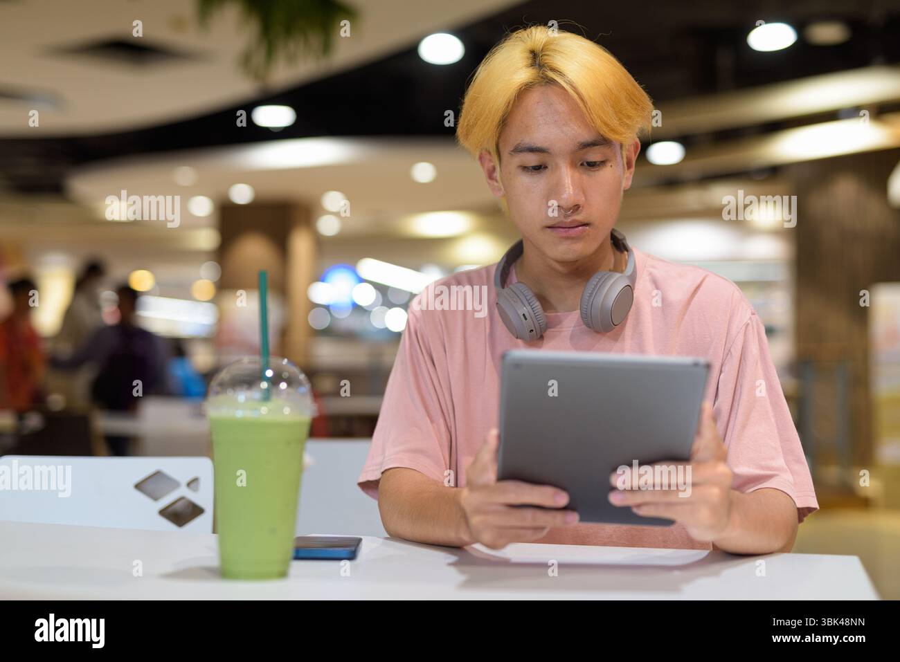 Young blonde gay man hi-res stock photography and images - Alamy