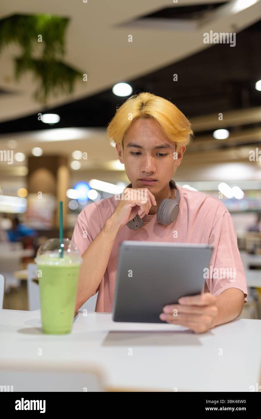 Young blonde gay man hi-res stock photography and images - Alamy