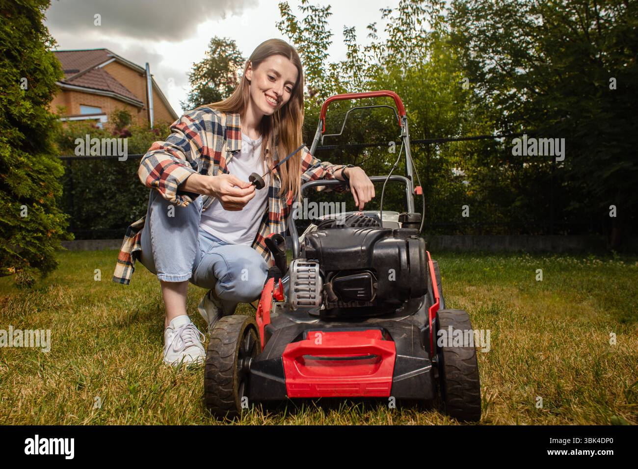 Lawnmower trimming grass in country hi-res stock photography and images - Alamy