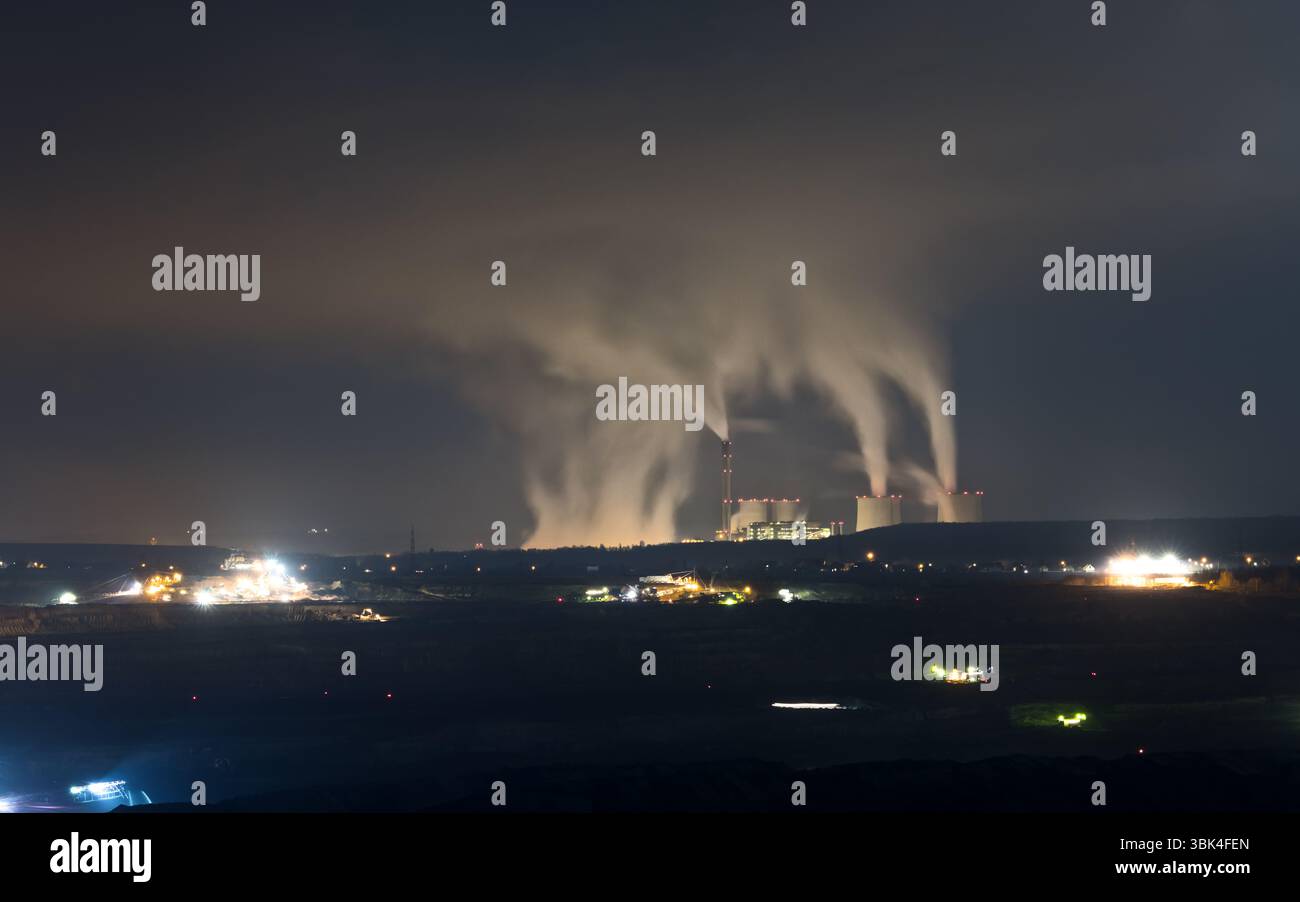 Huge and modern powerplant producing heat at night hi-res stock ...