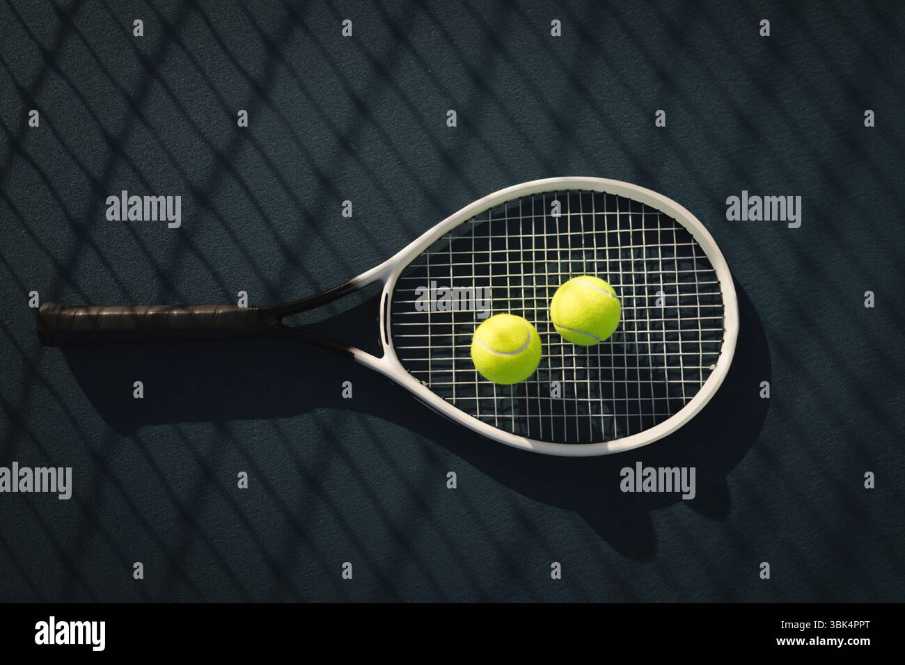 Flat design showing tennis racket lying on court, with two tennis balls ...