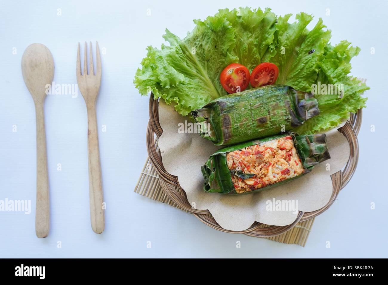 Nasi bakar is an Indonesian food, rice wrapped in banana leaves and ...