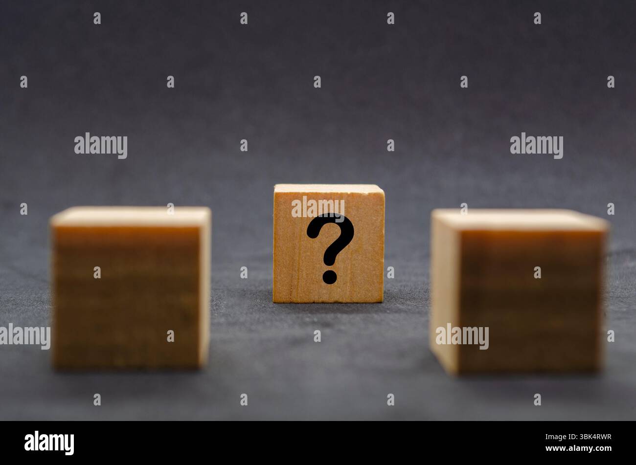 Wooden cube black question hi-res stock photography and images - Alamy