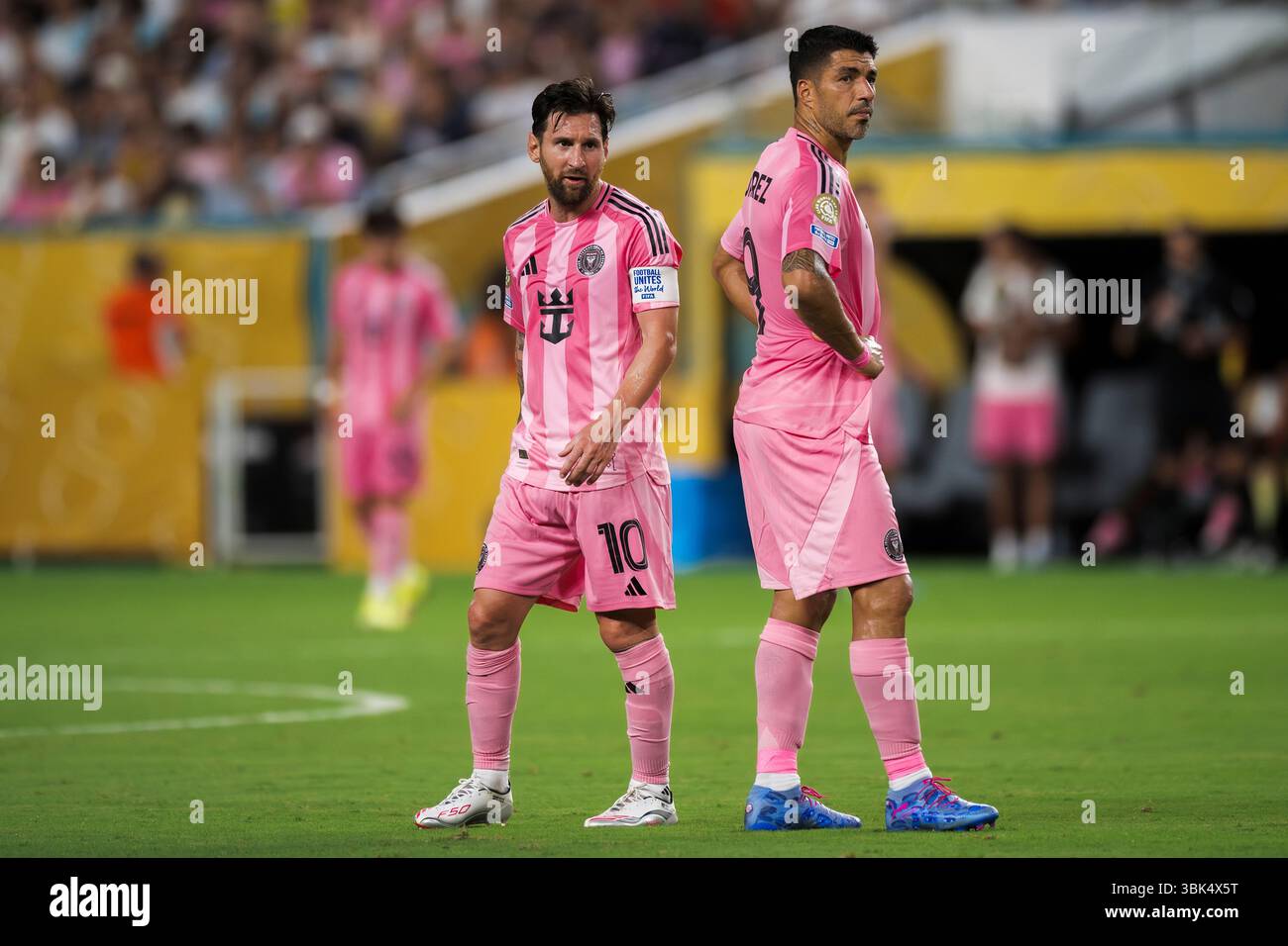 Lionel Messi of Inter Miami CF looks next to Luis Suarez of Inter Miami ...