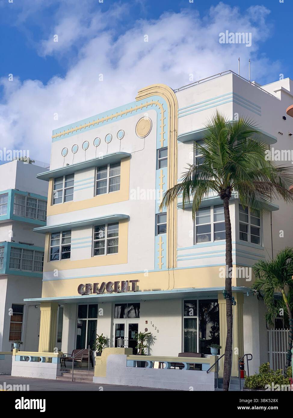 Vibrant Art Deco buildings line the iconic Ocean Drive in Miami Beach, Florida. This image ...
