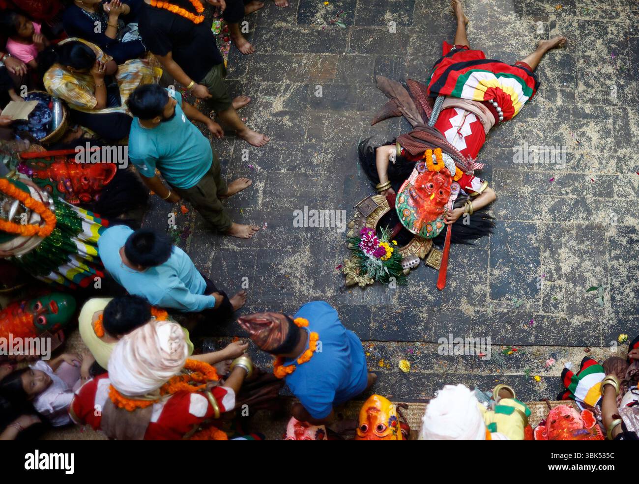 Bhaktapur, Nepal. 19th June, 2025. A masked dancer performs the sacred ...