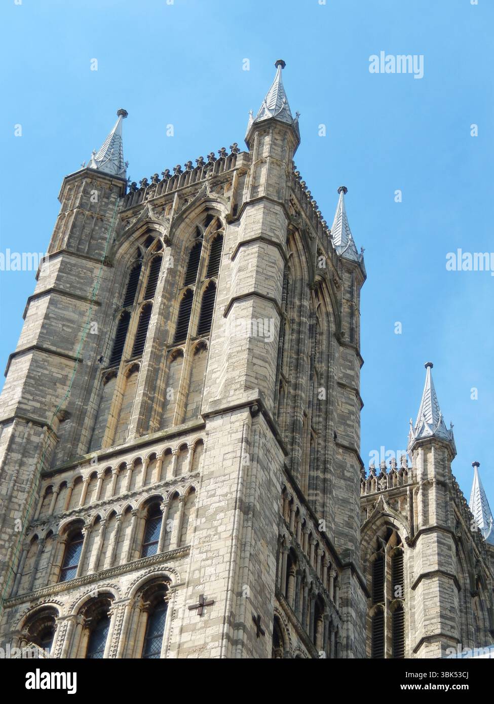 Historic Gothic Cathedral Tower Against Clear Blue Sky. Lincoln, England Stock Photo - Alamy