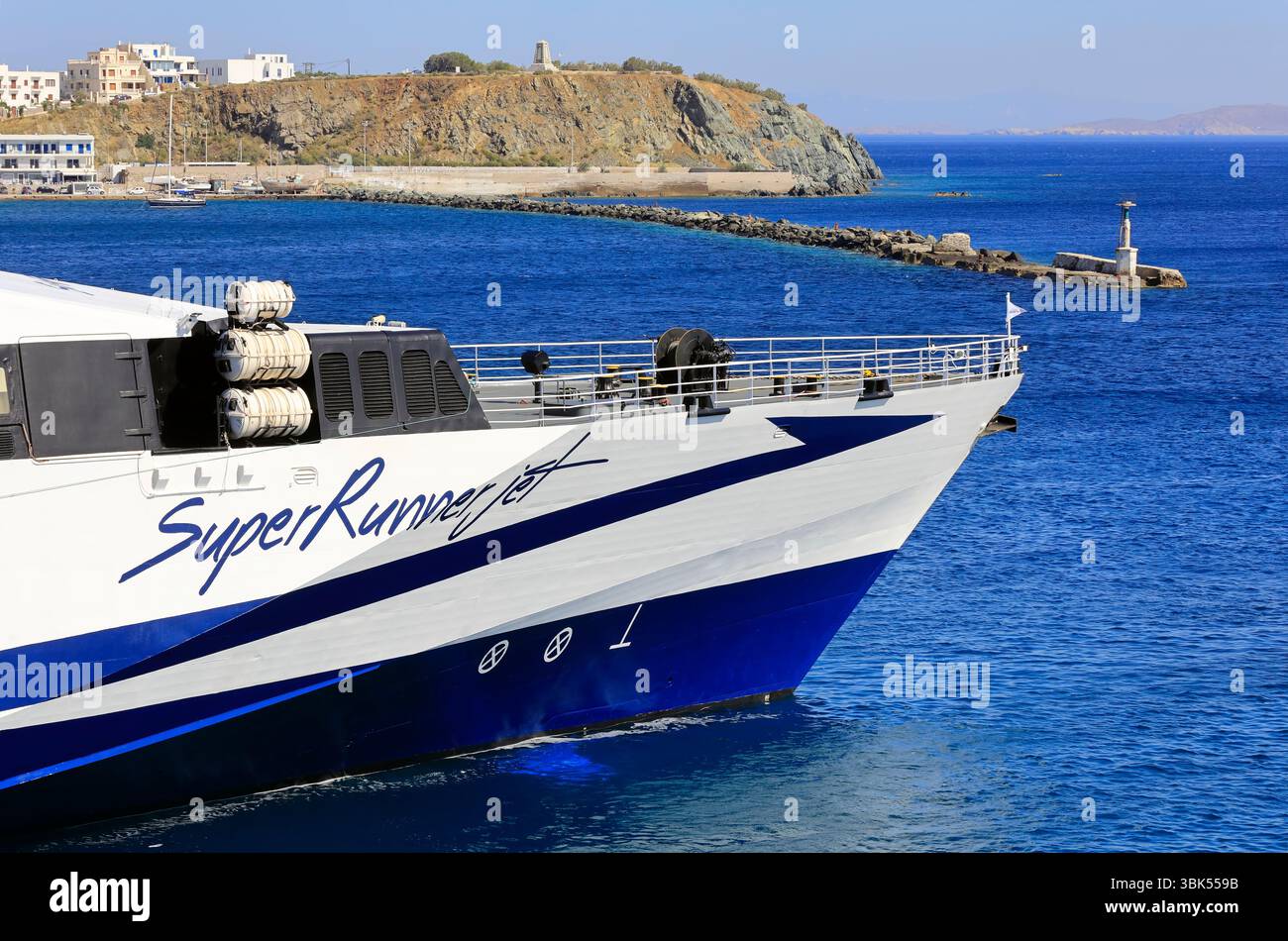 Seajets Super Runner Greek ferry boat, leaving Tinos, The Cyclades island group, Greece. June ...