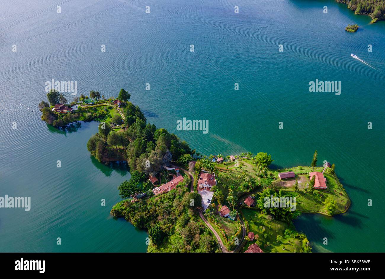 Breathtaking aerial view of lush green islands surrounded by turquoise ...