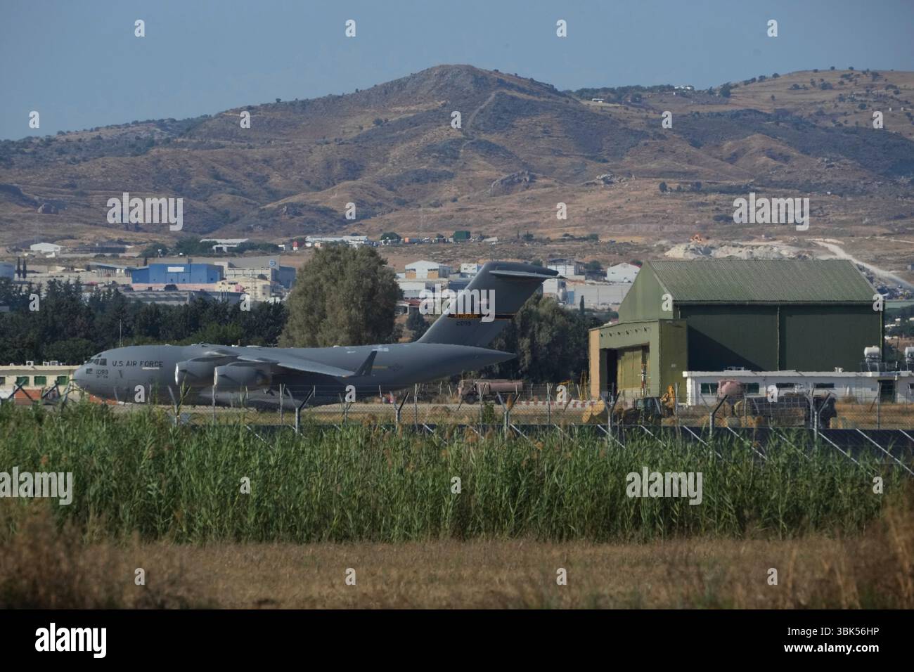 A US Air Force C-17 Globemaster transport aircraft sits on the tarmac ...
