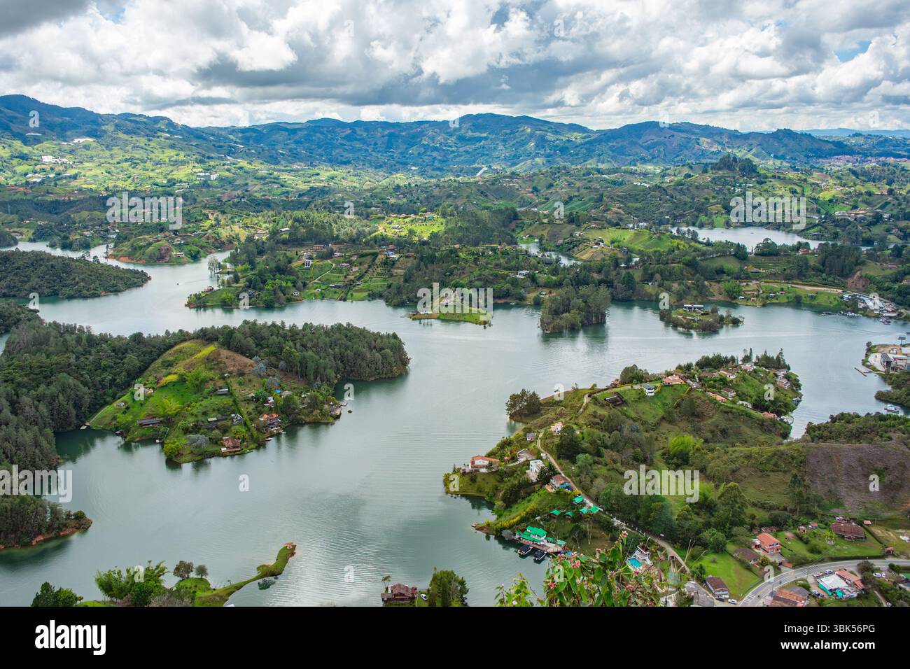 Stunning aerial view of lush green hills and lakes in Guatape ...