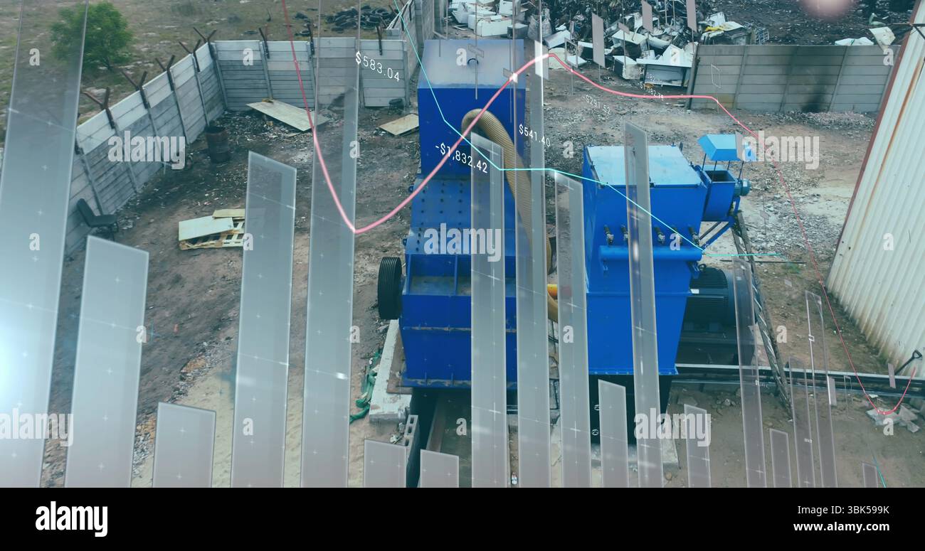 Operating blue industrial machines crushing scrap in scrap yard, with ...