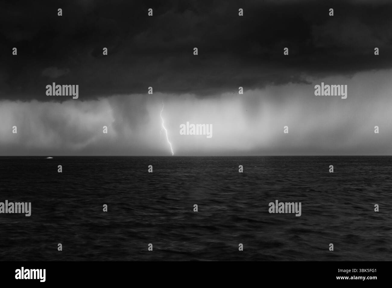 Rain over sea Black and White Stock Photos & Images - Alamy