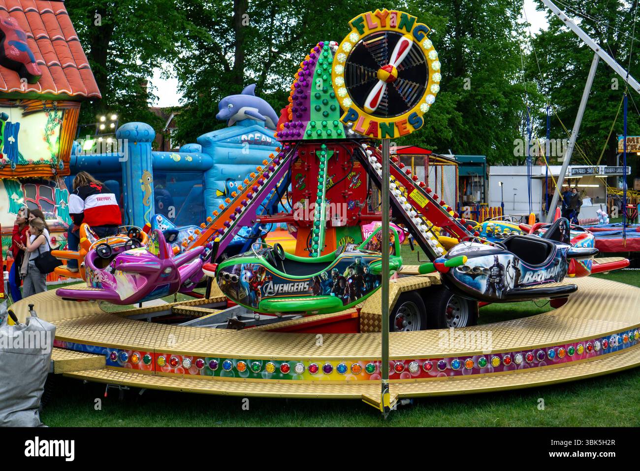 A colorful fairground ride in Saffron Walden, Essex, with a 'Flying ...