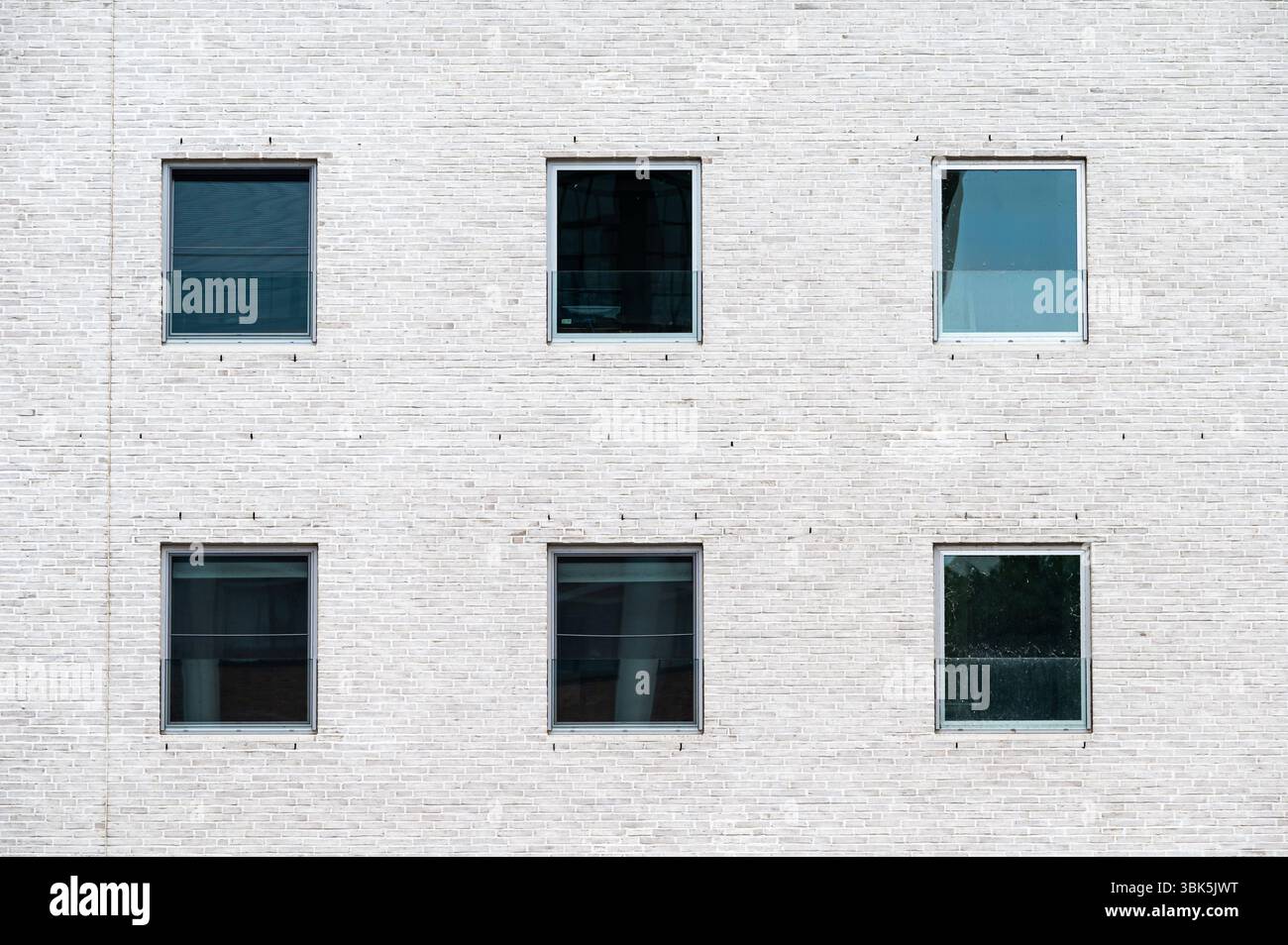 Patterned windows of contemporary apartment blockin Leuven Vaartkom ...