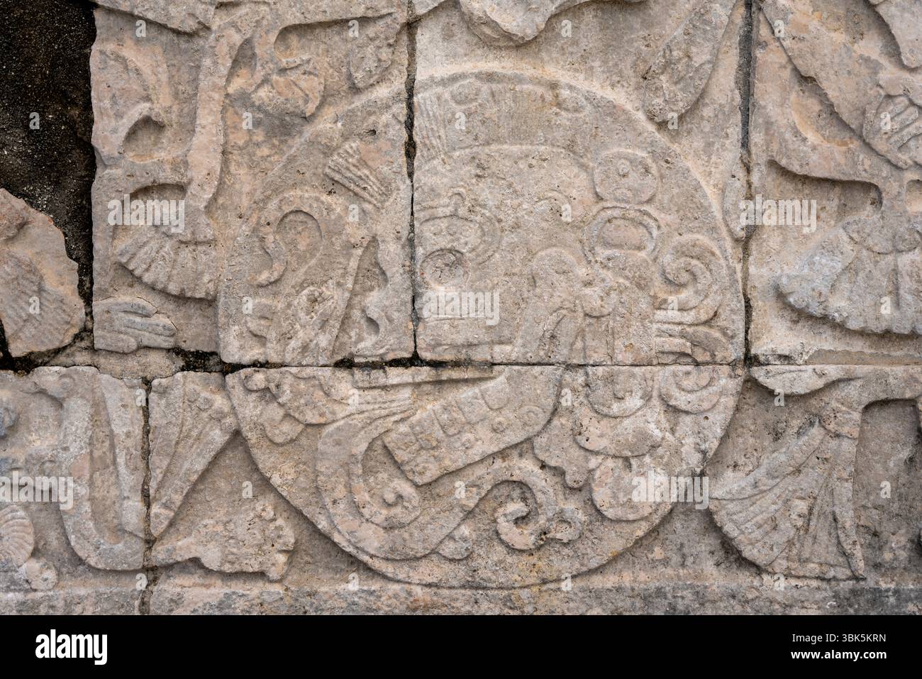 Mayan Ball Court carved stone relief with circular motif and intricate ...