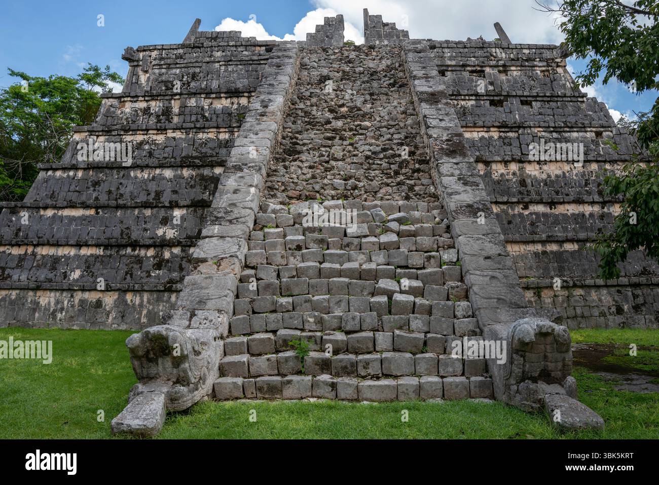 The Ossuary stepped pyramid temple with stone architecture and green ...