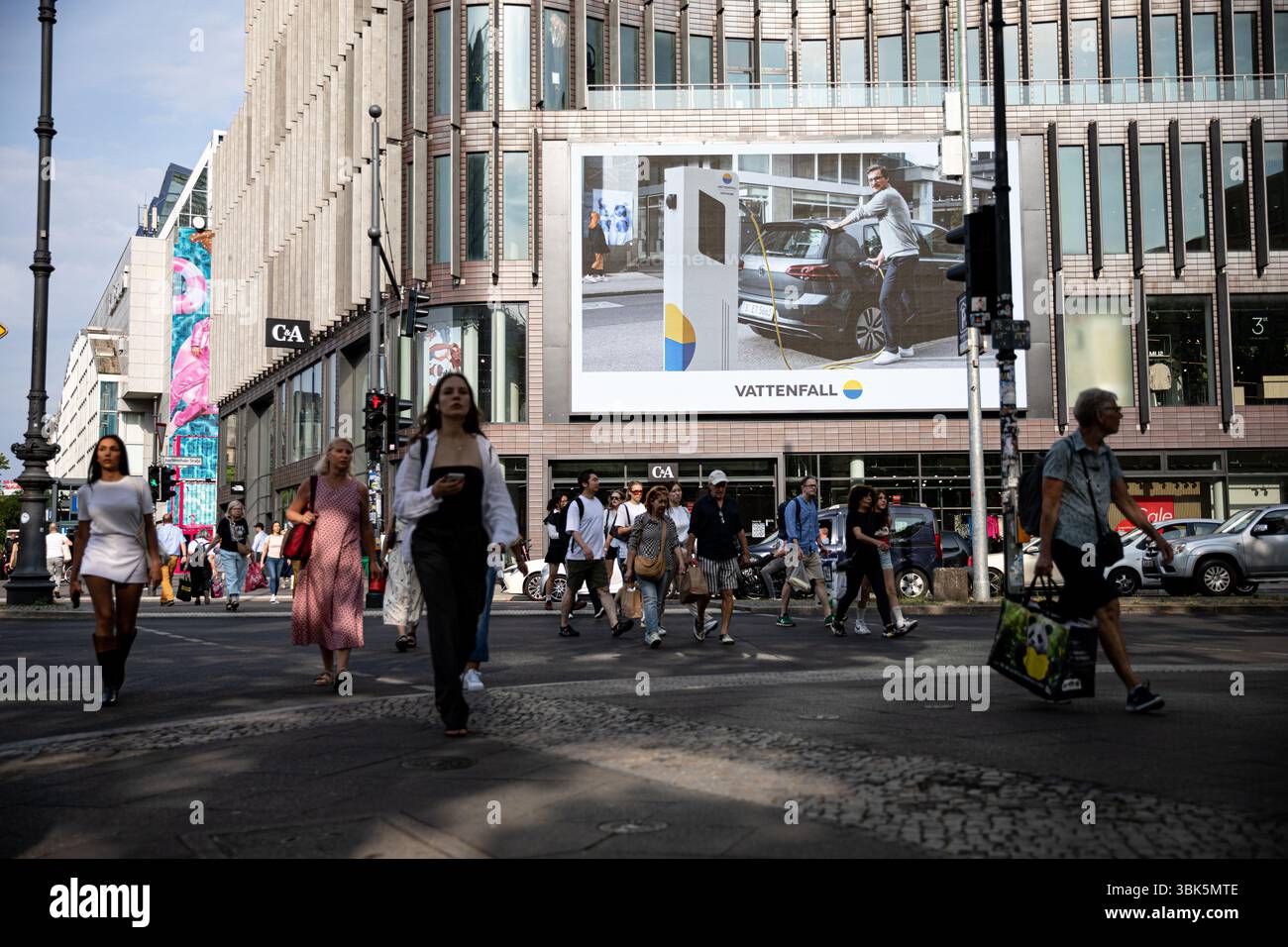 Pedestrians, shoppers, and tourists filled the streets of Berlin's ...