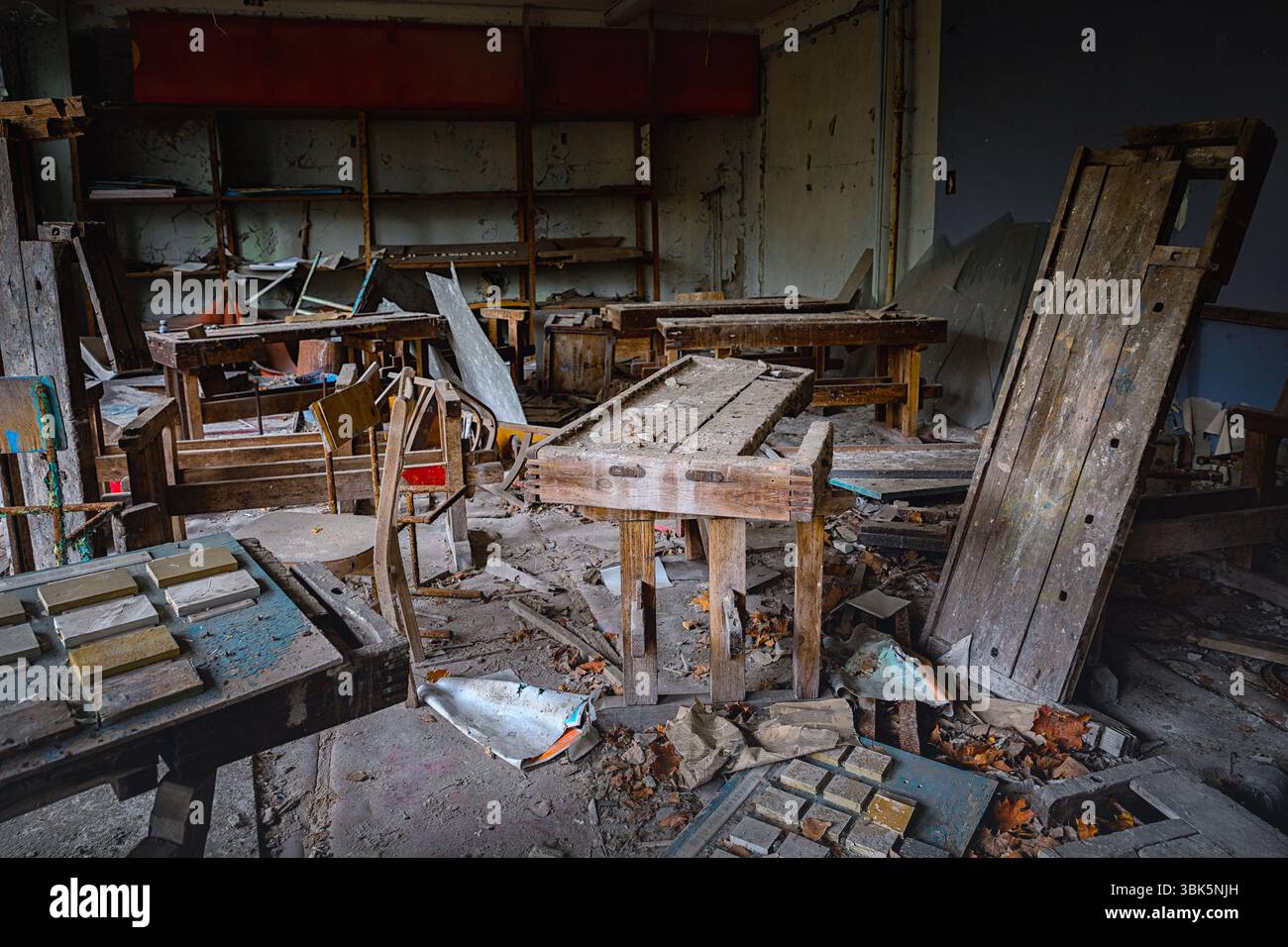 Messy and abandoned classroom in ghost town angle shot Stock Photo - Alamy