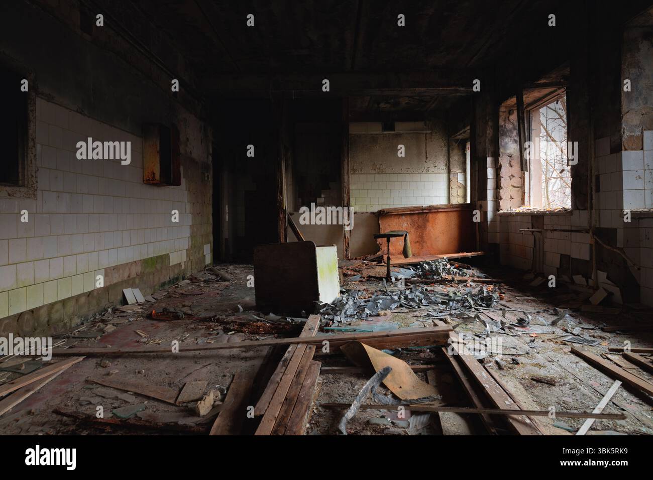 Abandoned and messy room in ghost town angle shot Stock Photo - Alamy