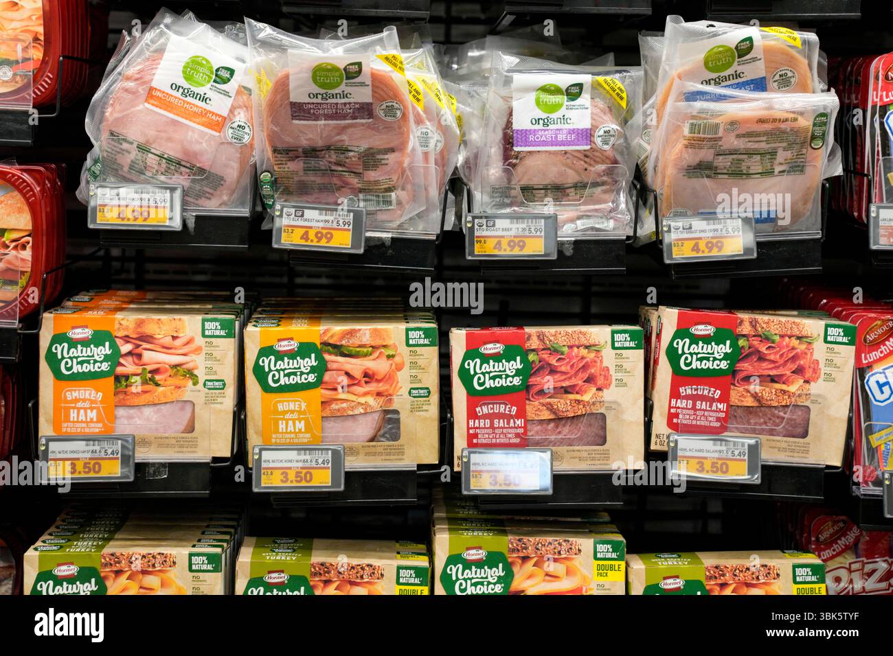 Electronic grocery labels are displayed at a Kroger grocery store, in ...