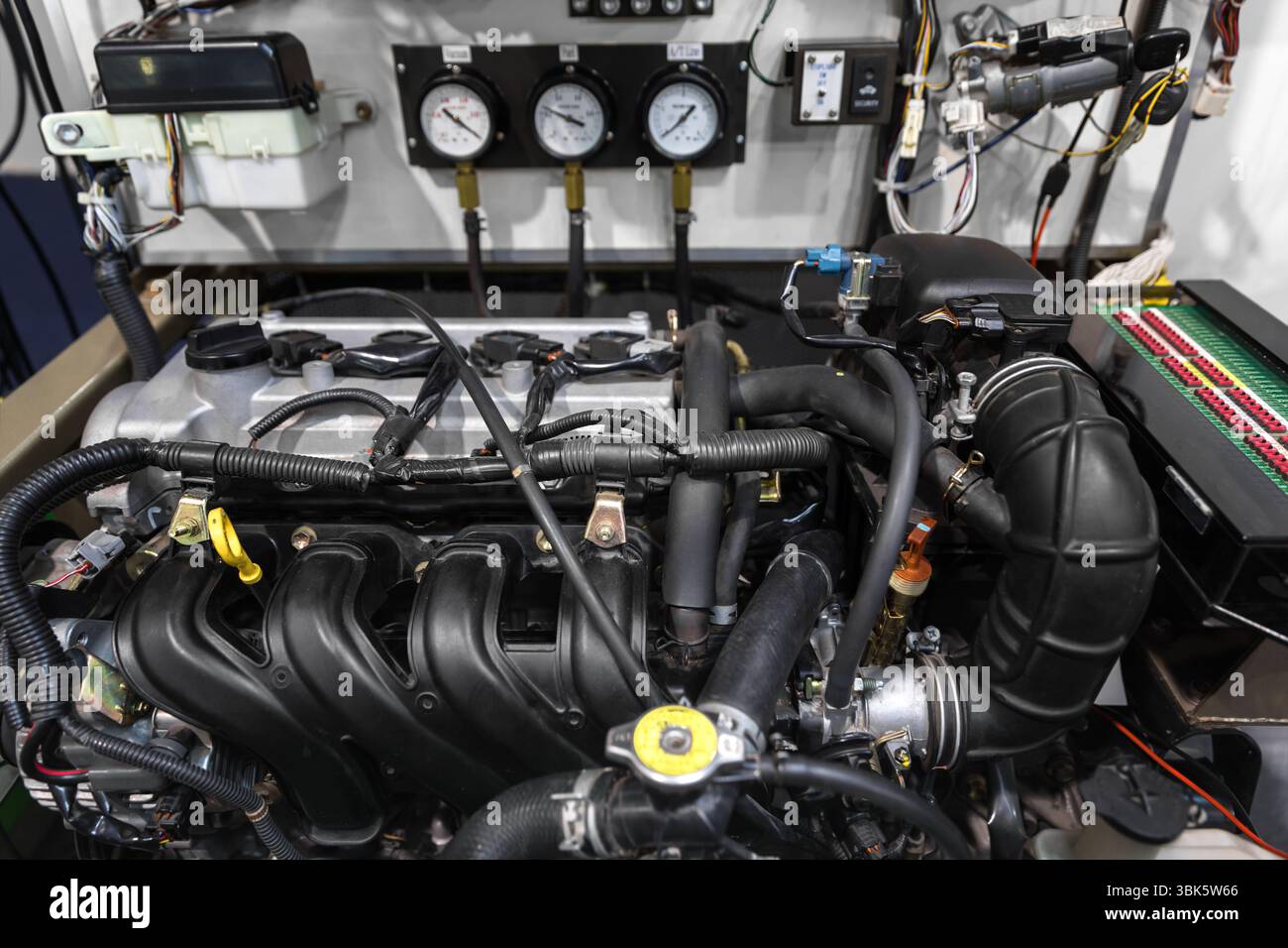 Detail photo of black car engine under the hood Stock Photo - Alamy