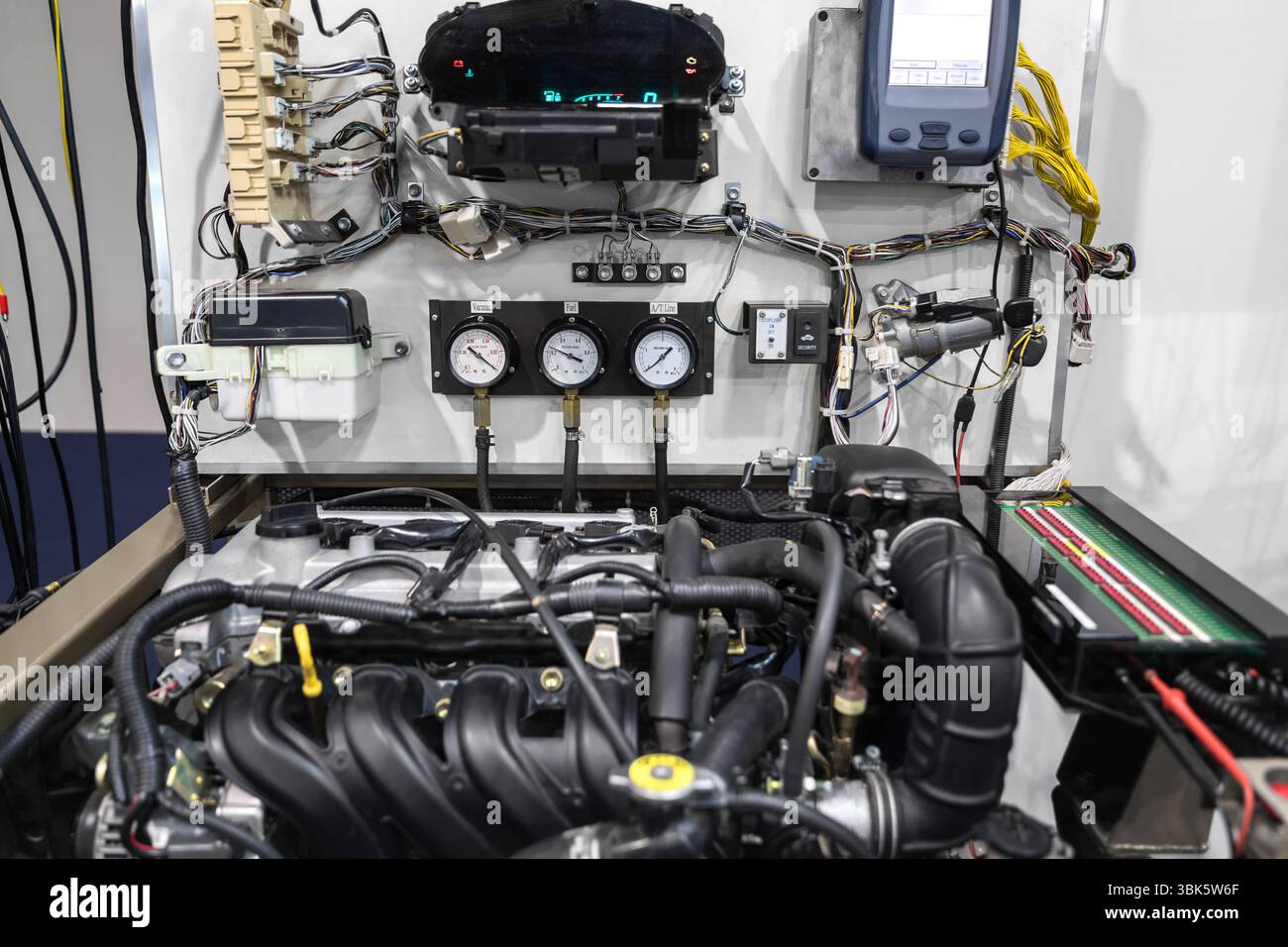 Detail photo of black car engine under the hood Stock Photo - Alamy