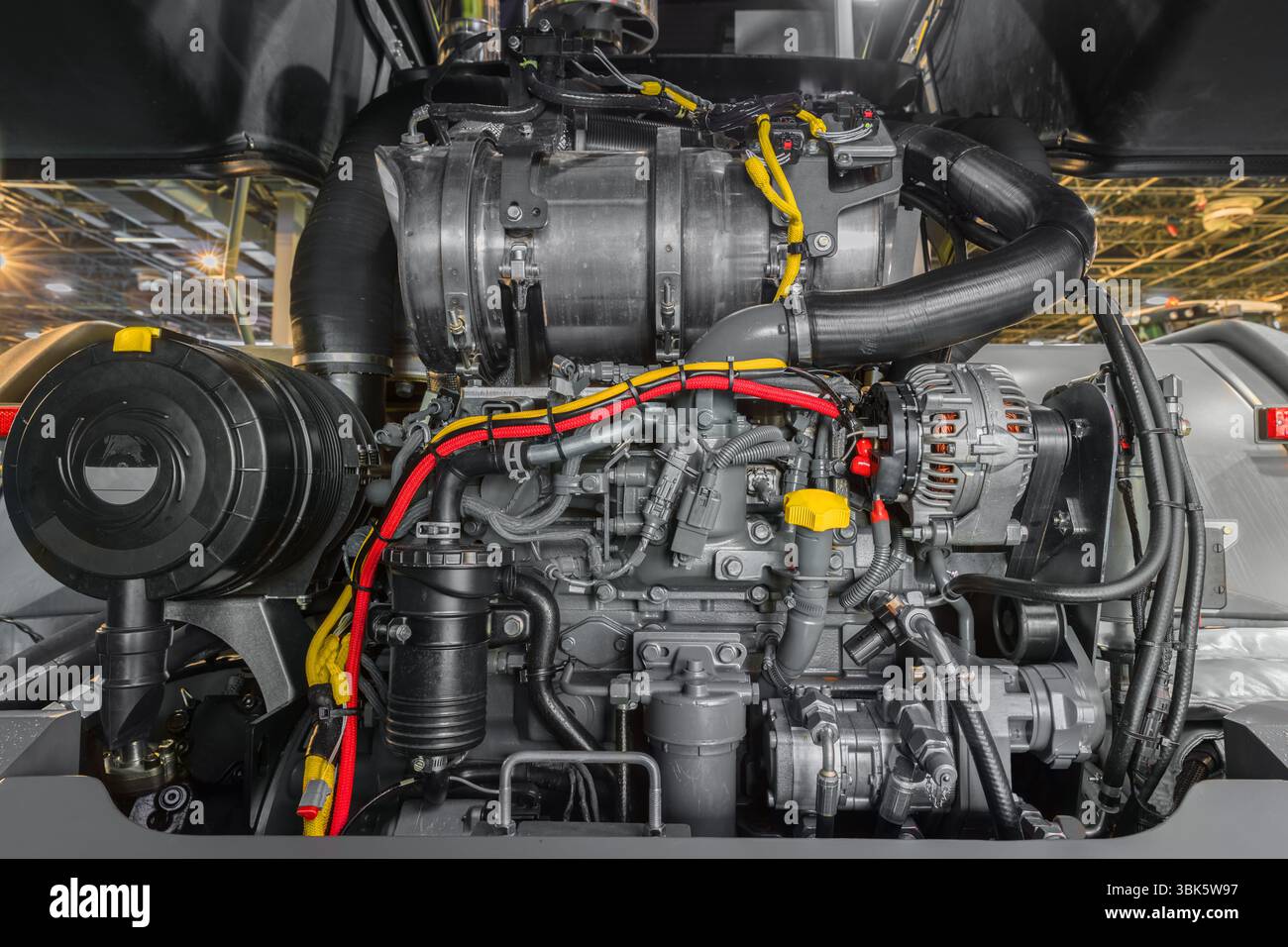 Detail photo of black car engine under the hood Stock Photo - Alamy