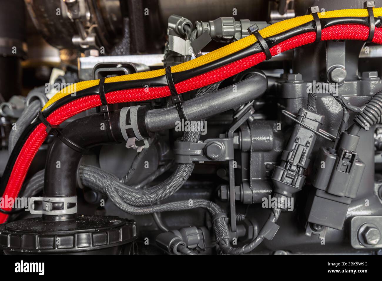 Detail photo of black car engine under the hood Stock Photo - Alamy