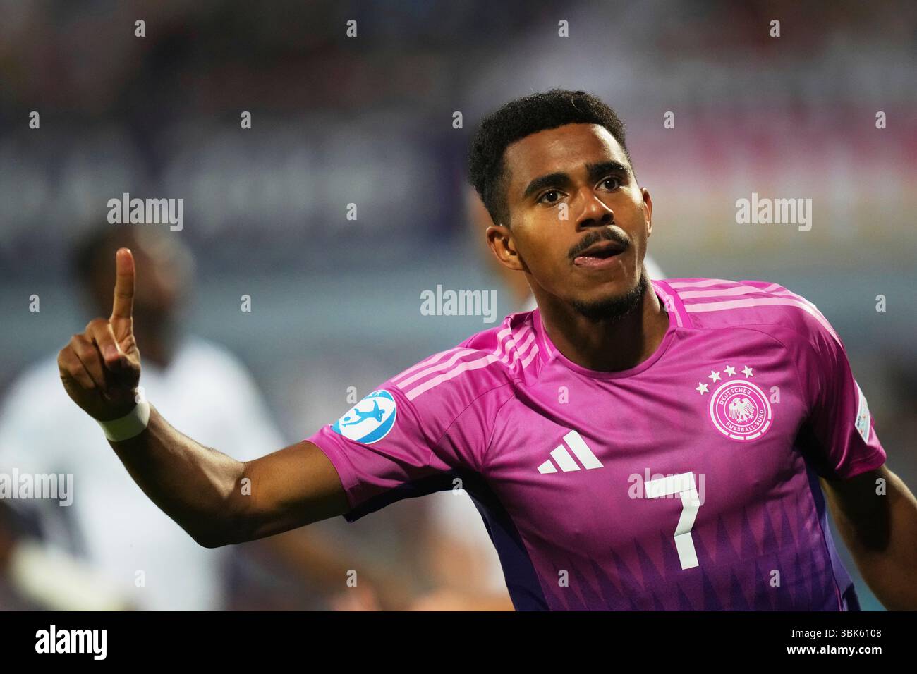 Germany's Ansgar Knauff celebrates after scoring the opening goal ...